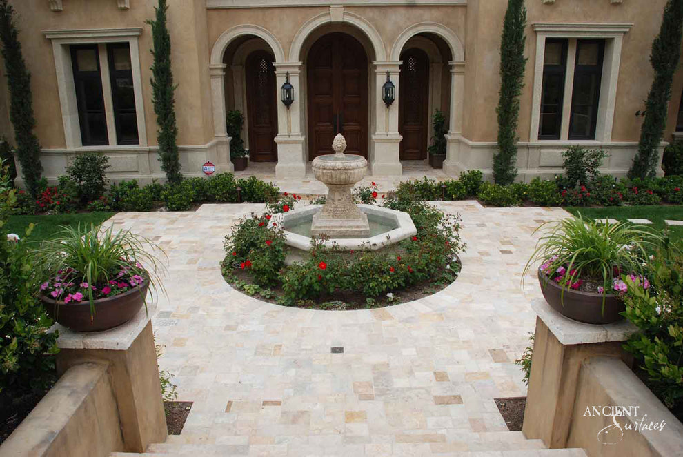 Symmetrical Grace: Limestone Fountain in an Elegant Courtyard ...
